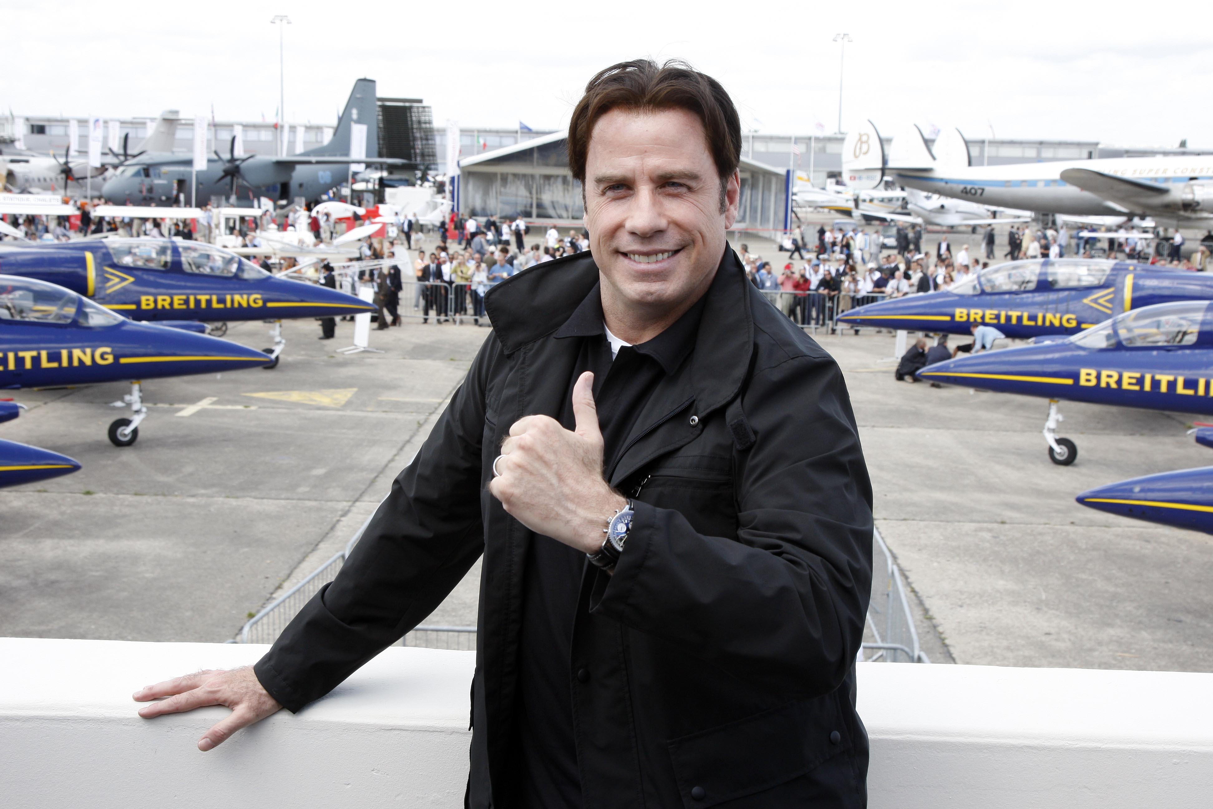 John Travolta shows off private customised Boeing Business Jet: 'So far ...